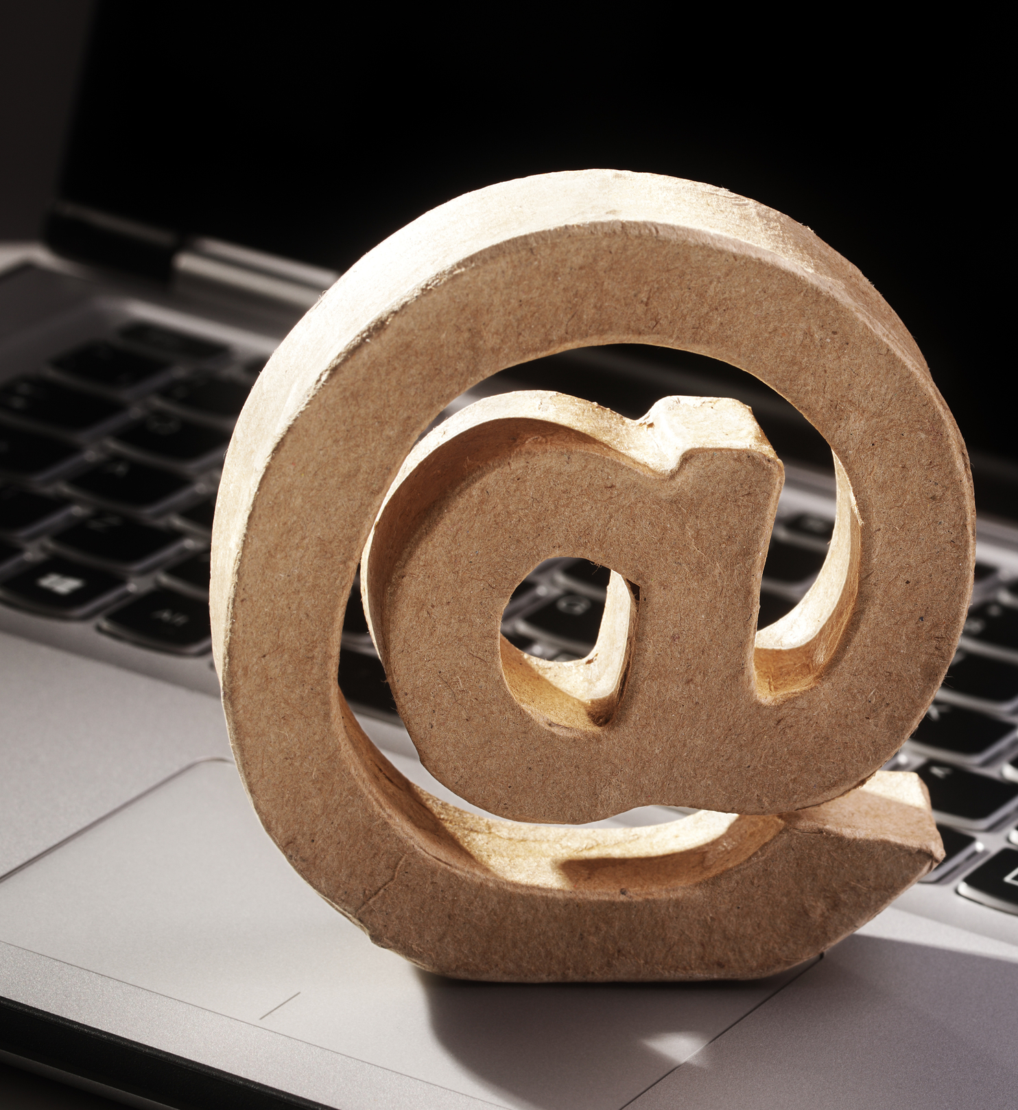 The Origin of the @ Symbol and the First Email Message